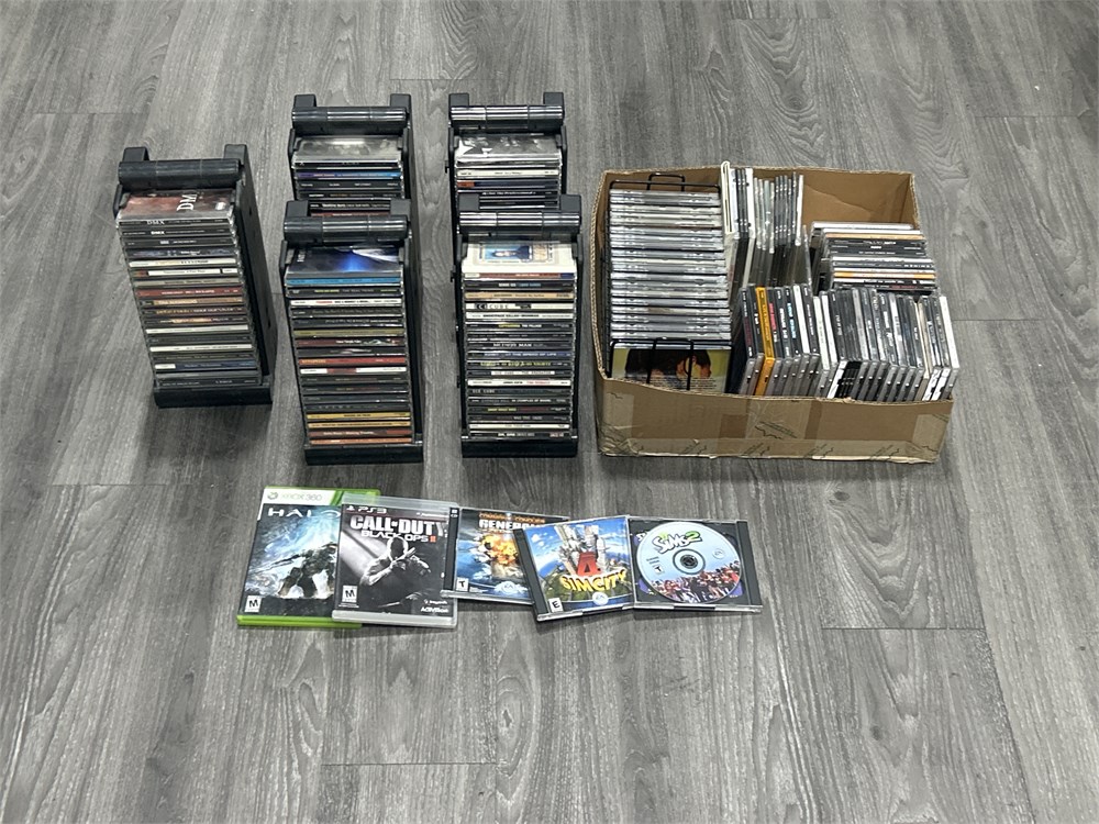 Urban Auctions - LARGE LOT OF CDS W/FEW VIDEO GAMES
