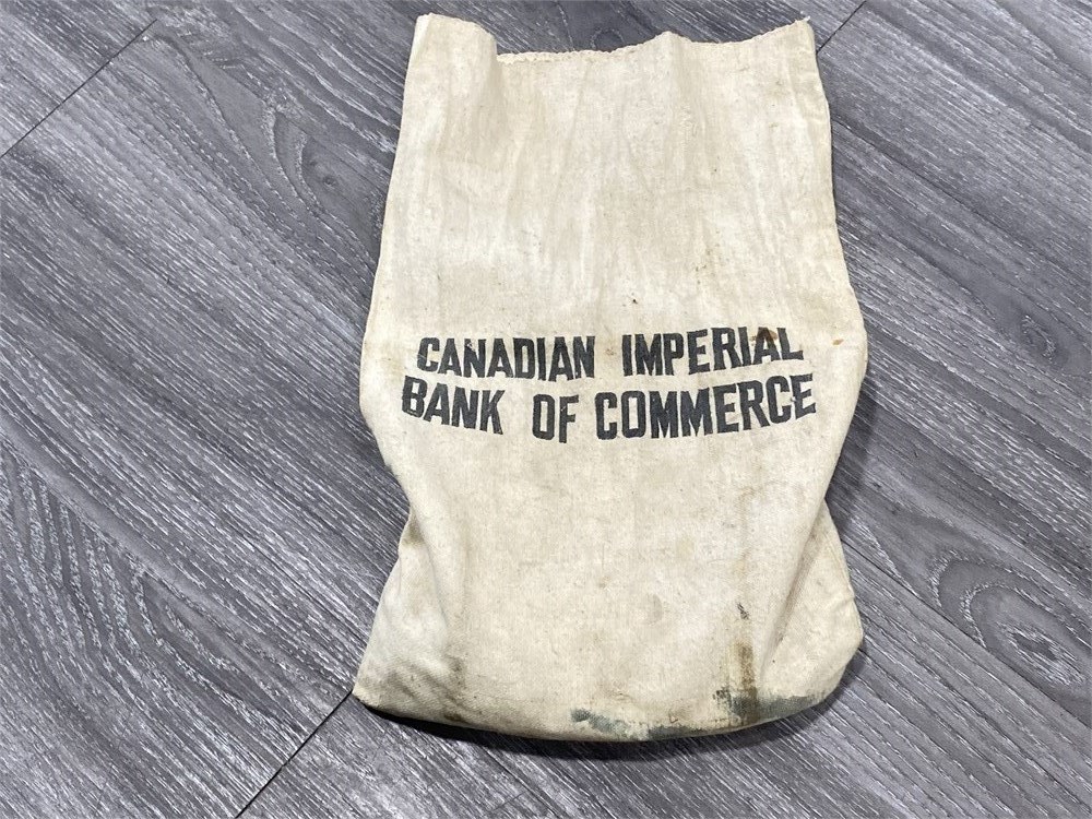 Urban Auctions - LOT OF PENNIES INSIDE VINTAGE CIBC COIN BAG