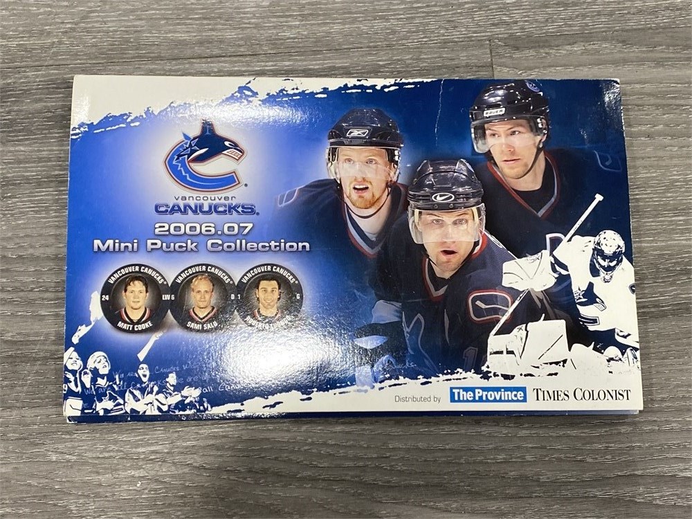 Urban Auctions - VANCOUVER CANUCKS 2006-07 MINI PUCK COLLECTION COMPLETE