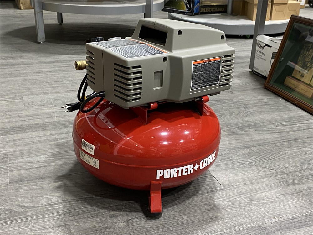 Urban Auctions - PORTER CABLE AIR COMPRESSOR - 2.6 SCFM @90 PSI - WORKING