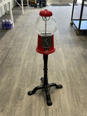 Urban Auctions - VINTAGE BUBBLE GUM MACHINE ON ANTIQUE STYLE BASE 38” TALL